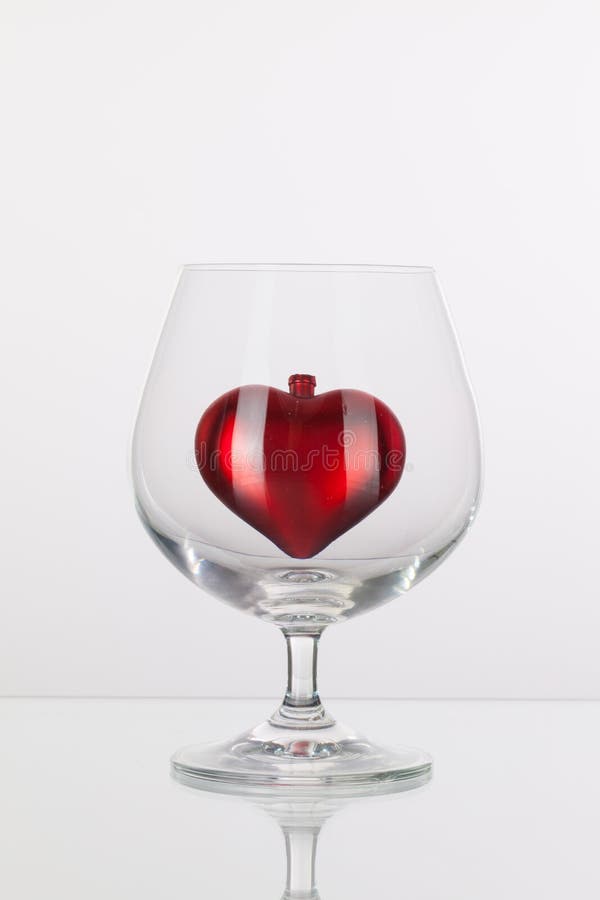 Red Heart Inside a Glass of Cognac Stock Image - Image of happy, party ...