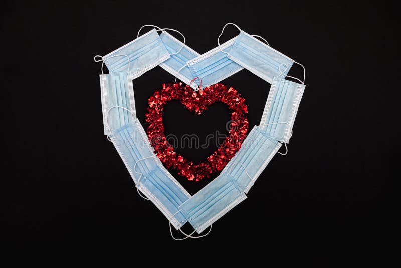 A Red Heart Inside a Heart of Masks Stock Image - Image of masks ...