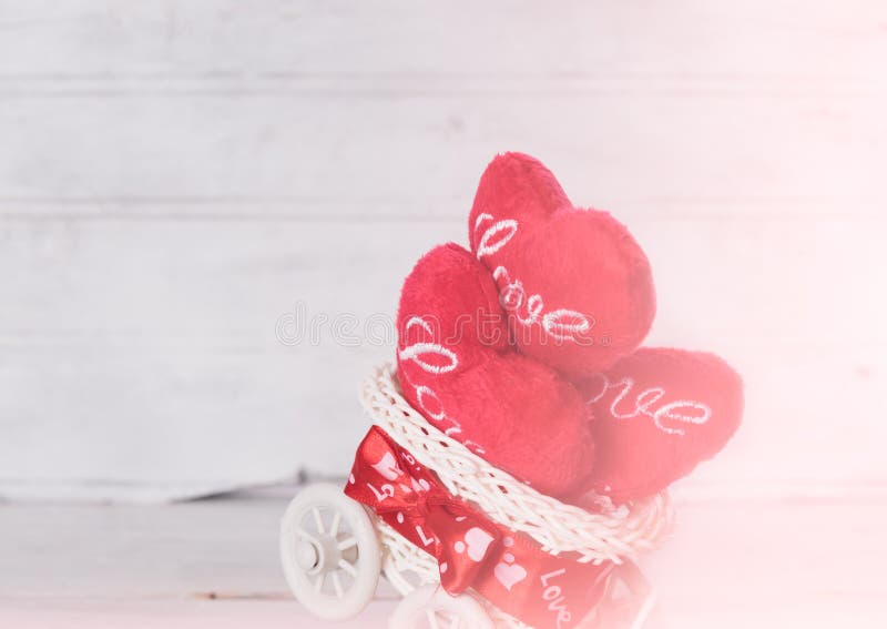 Red Heart Items in White Basket on White Woodeb Board with Vintage ...