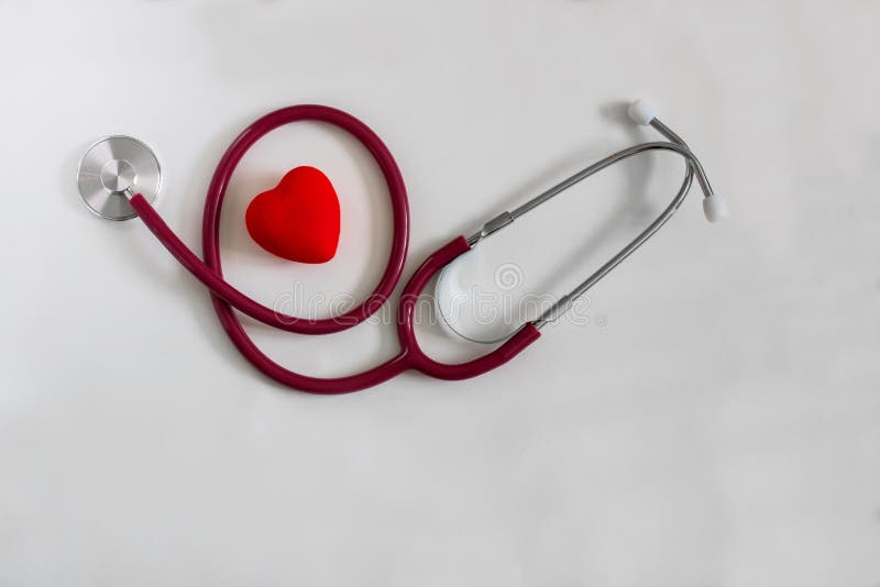 Red Heart in Loop of Stethoscope on the Empty White Background ...