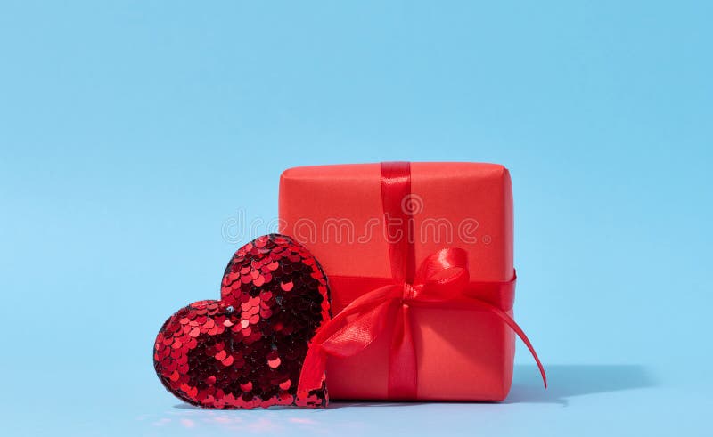 Red Heart Made of Sequins and a Box Wrapped in Red Paper ...