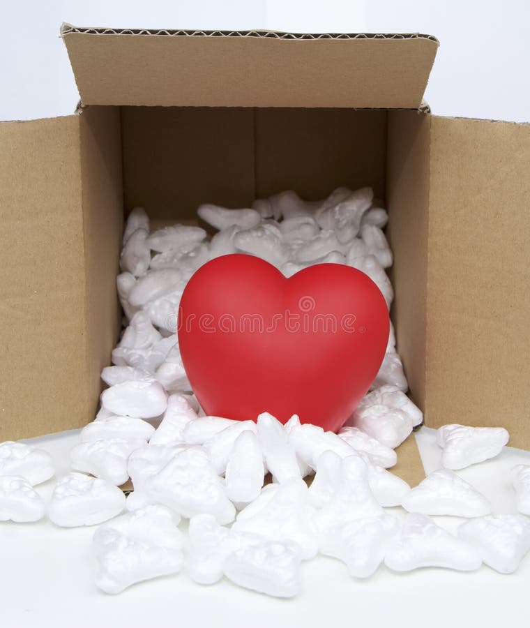 Red Heart in Mail Package Box with Styrofoam Stock Photo - Image of ...