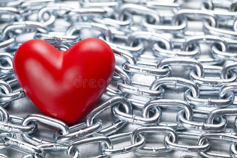 Red Heart on Steel Chains and Aluminum Background Stock Image - Image ...