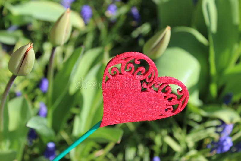 A Red Heart Object in a Spring Garden Stock Image - Image of decorative ...