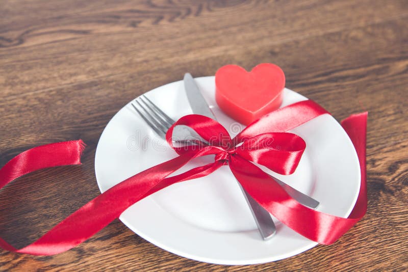 Red heart on a plate stock photo. Image of fork, serving - 174026790