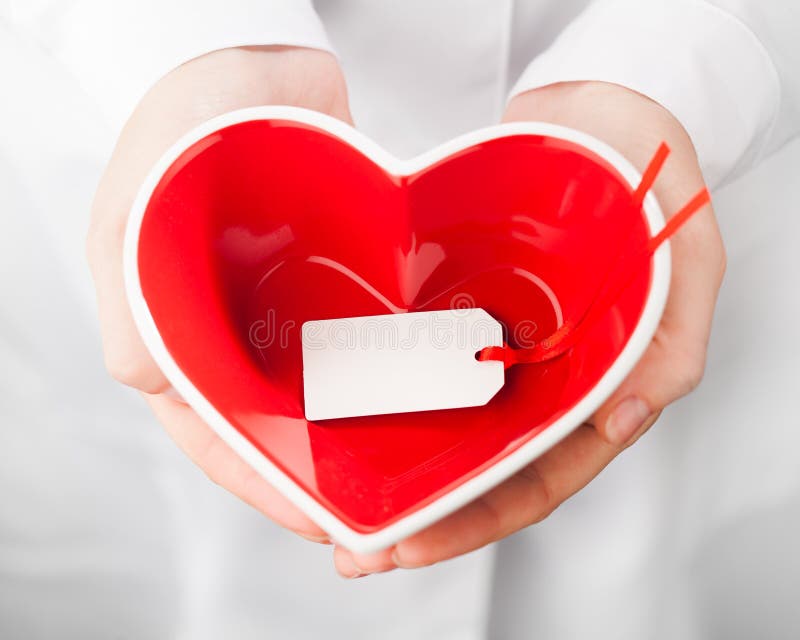 Red heart shape in hands stock photo. Image of care, concept - 35675544