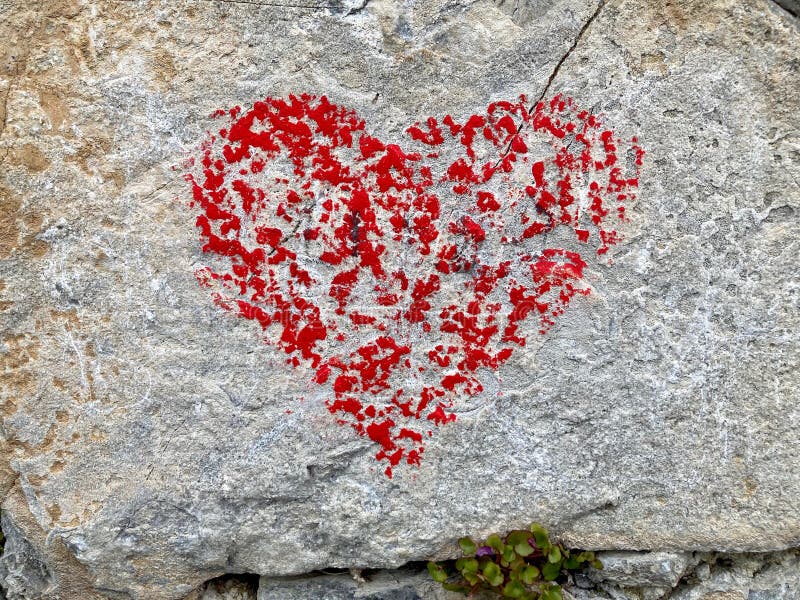 Red Heart Shape Painted on a Rock Stone in Switzerland Stock Image ...