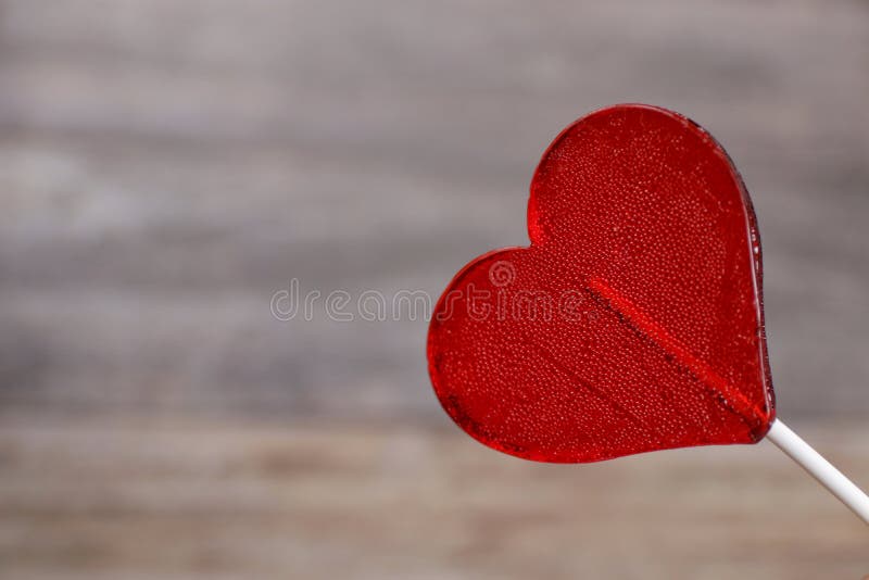Red Heart Lollipop on Wooden Background Stock Image - Image of heart ...