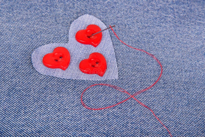 Red Heart Shaped Buttons with Needle and Red Thread Stock Image - Image ...