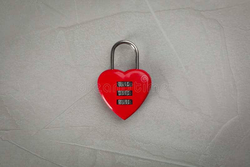 Red Heart Shaped Combination Lock on Light Grey Table, Top View Stock ...