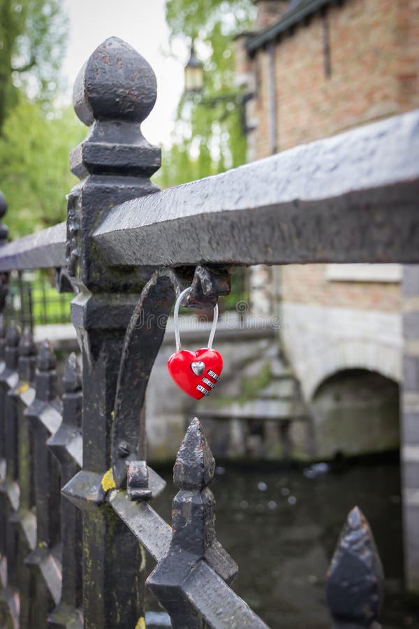 Red Heart Shaped Love Padlock on the Bridge in Bruges, Belgium Stock ...