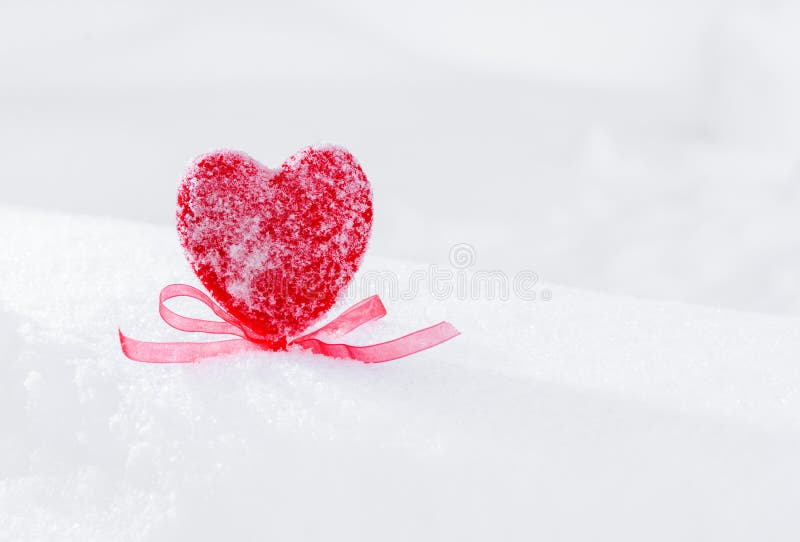 Red heart in the snow stock photo. Image of holiday - 211663836