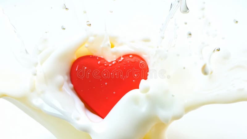 Red Heart Splashes into Milk Creating Captivating Visual Effects in ...