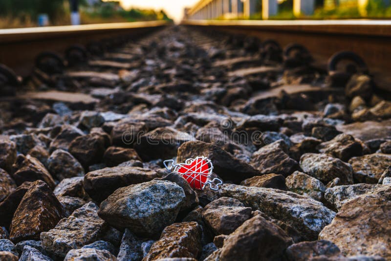 A Red Heart on a Stone Pile in a Train Track Stock Image - Image of ...