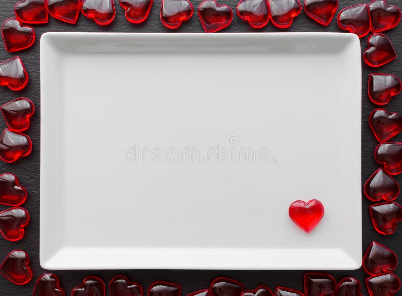 Red Heart on White Plate with Frame and Hearts Pattern Stock Photo ...