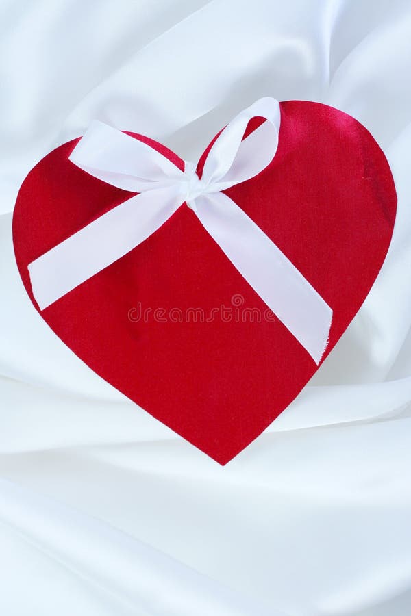 Red heart on white satin stock photo. Image of cloth - 27399902