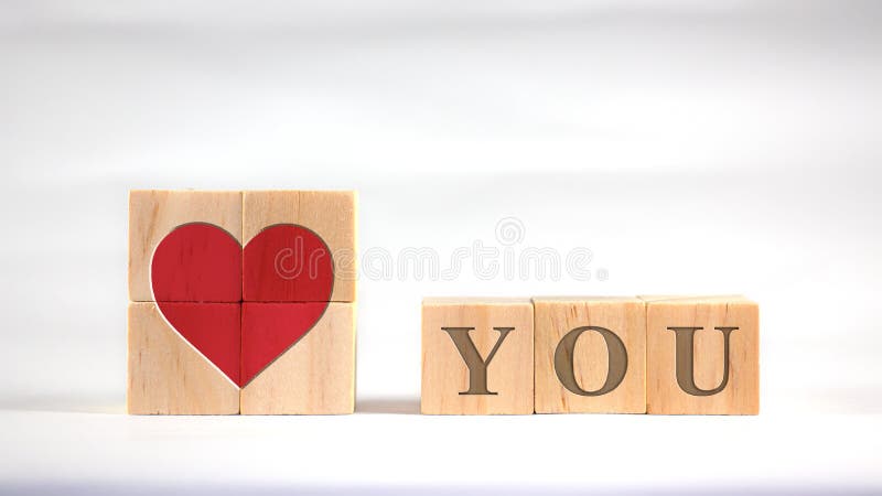 Red Hearts and Letters are Displayed on Square Wooden Blocks. Indicate ...