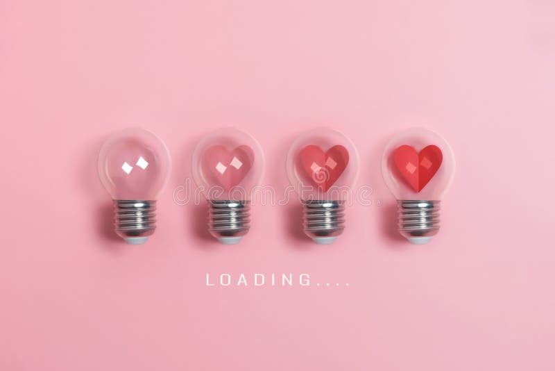 Red Hearts in Light Bulbs. Loading Progress Bar on Pink Background ...