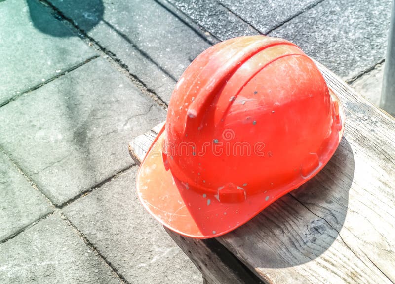 Red Helmet Standing on Concrete Roadside at Construction Site Stock ...