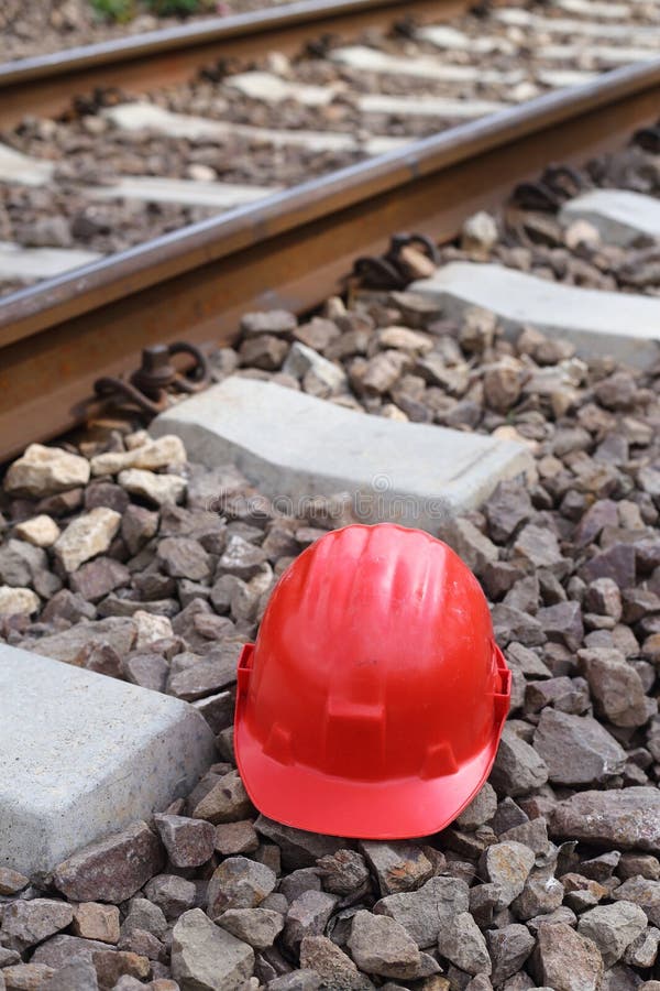 Red helmet on a work site stock image. Image of protect - 320986281