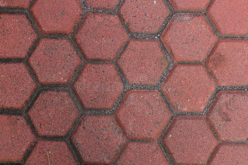 Red Hexagonal Pavers Form a Patterned Walkway Stock Photo - Image of ...