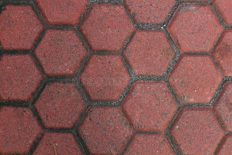 Red Hexagonal Paving Tiles Form a Pattern on a Sidewalk Surface Stock ...