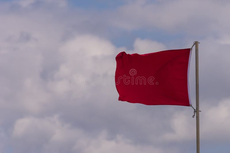 Red High Hazard Beach Caution Flag Stock Photo - Image of swimming ...