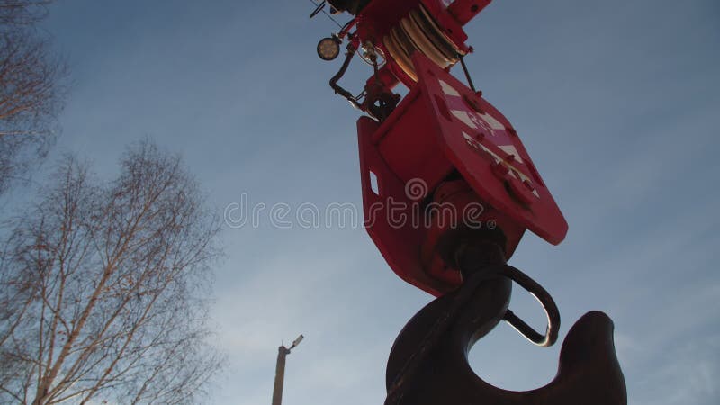 Red Hook of Crane at Construction Site Under Blue Sky Stock Footage ...