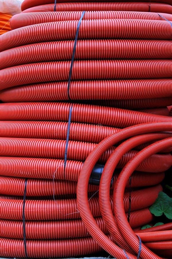 Red hose coils stock photo. Image of pile, hose, material - 97691356