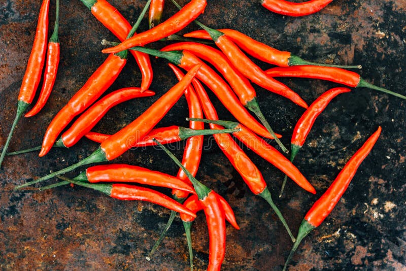 Red Hot Chili Peppers Over Rustic Surface - Fresh and Organic. Stock ...