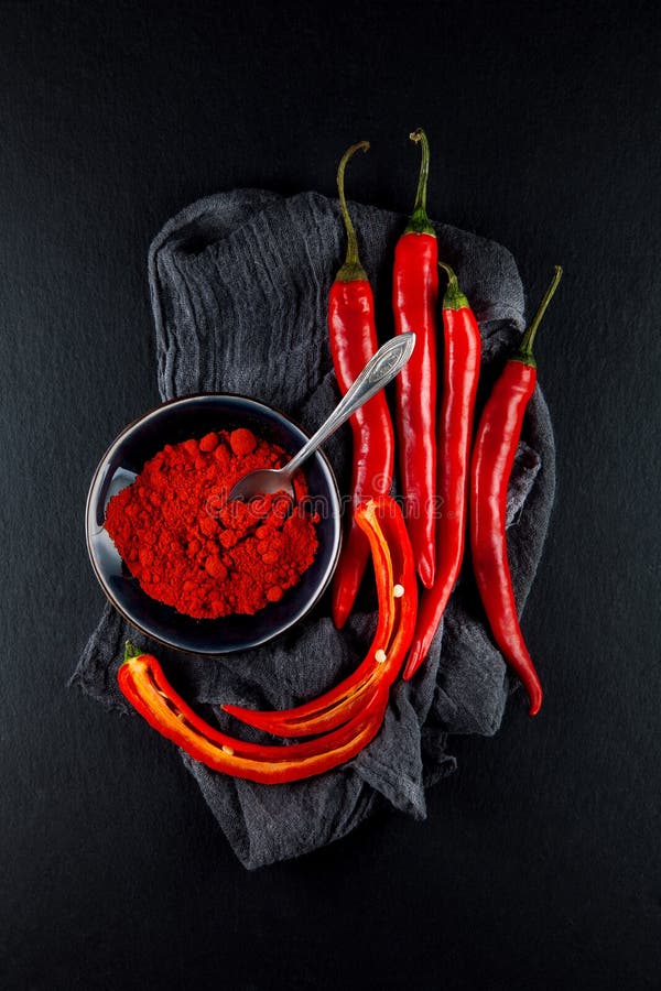 Red Hot Chilli Peppers Decorated on Slate Plate Kitchen Table Stock ...