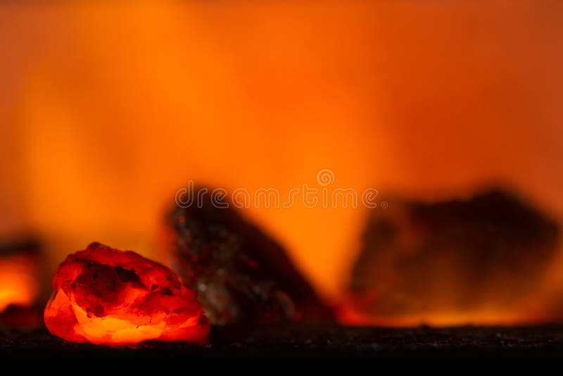 Red Hot Coal Bars in Focus on Dark Background with Flames. Background ...