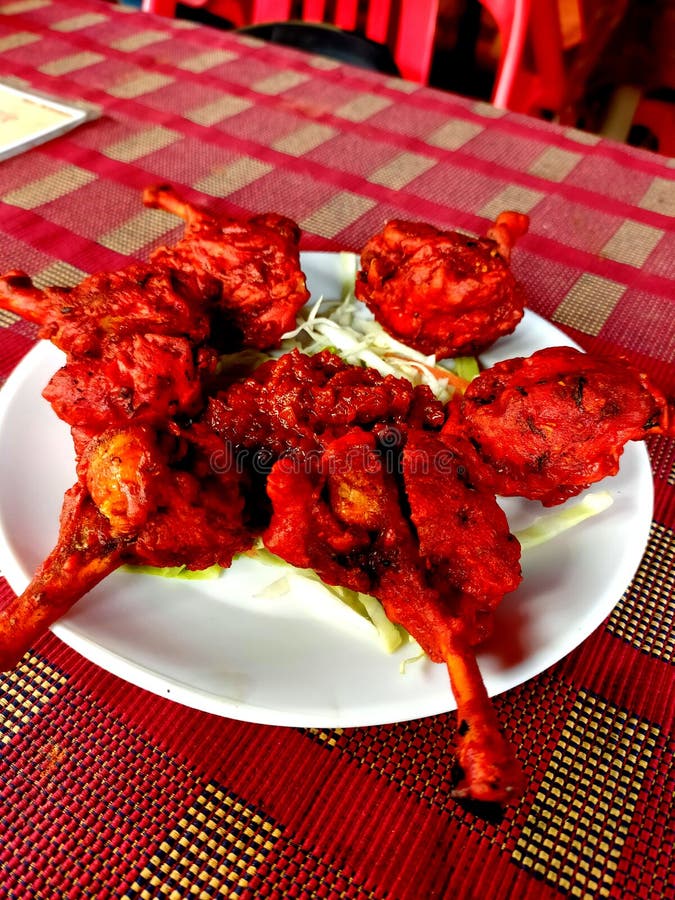Red Hot Fried Chicken Lollipop with Hot Red Chutney Sauce Stock Photo ...
