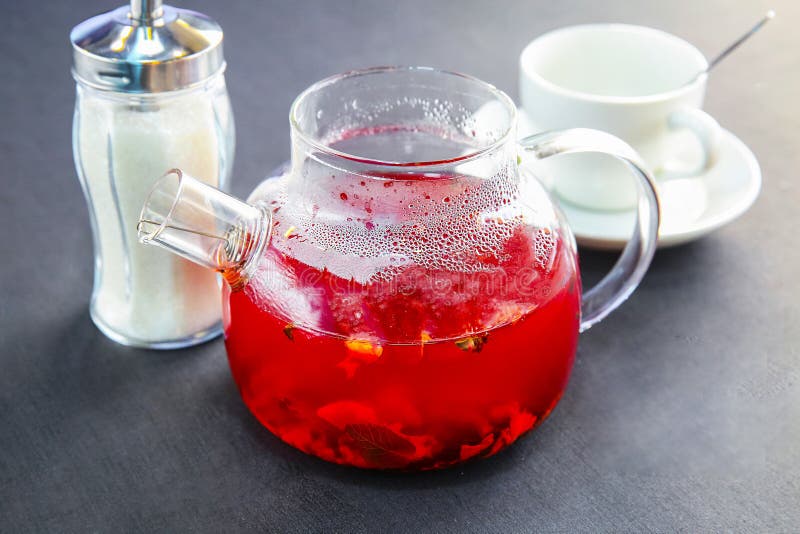 Red Hot Fruit Tea Brewed in a Glass Teapot Stock Image - Image of glass ...