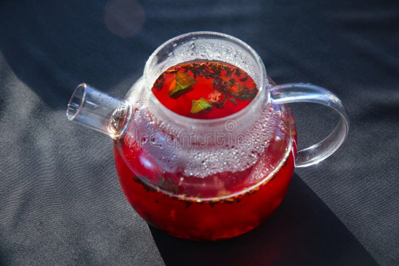 Red Hot Fruit Tea Brewed in a Glass Teapot Stock Image - Image of ...