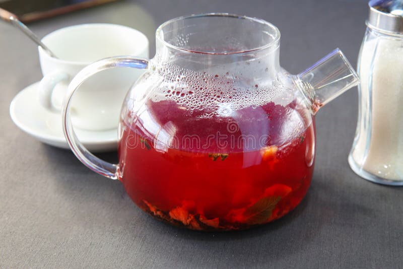 Red Hot Fruit Tea Brewed in a Glass Teapot Stock Image - Image of ...