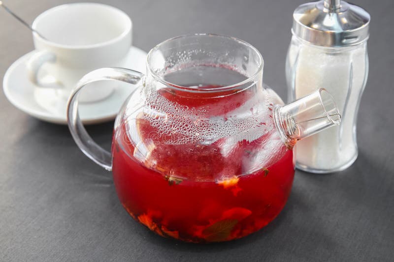 Red Hot Fruit Tea Brewed in a Glass Teapot Stock Image - Image of ...
