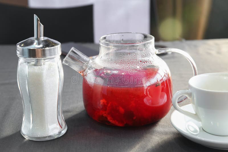 Red Hot Fruit Tea Brewed in a Glass Teapot Stock Image - Image of ...