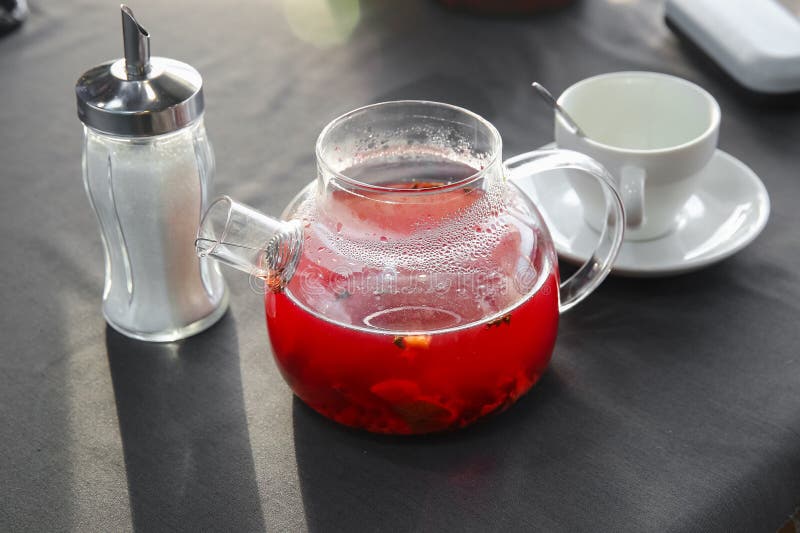 Red Hot Fruit Tea Brewed in a Glass Teapot Stock Image - Image of ...
