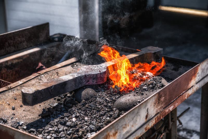 Red Hot Iron in the Burning Coal Stock Image - Image of orange, coal ...