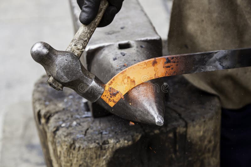Hot iron forge stock photo. Image of hand, hammer, glowing - 19596860