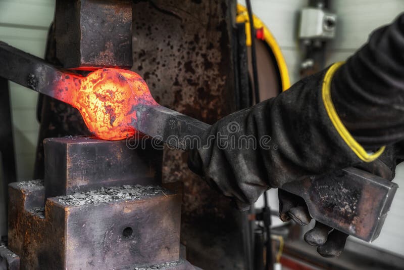 Red hot iron in the vise stock image. Image of forge - 267399869