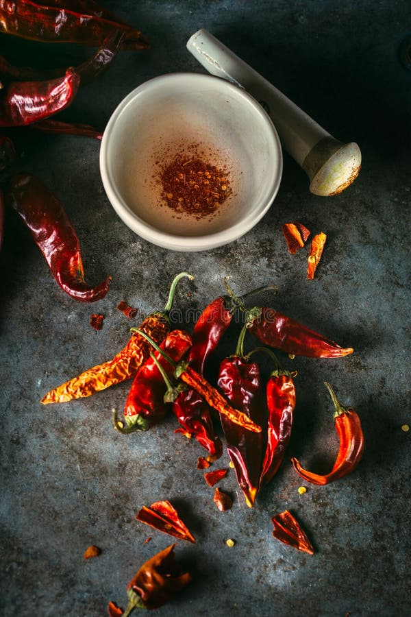 Spicy Crushed Peppers in a Granite Mortar. Stock Photo - Image of ...