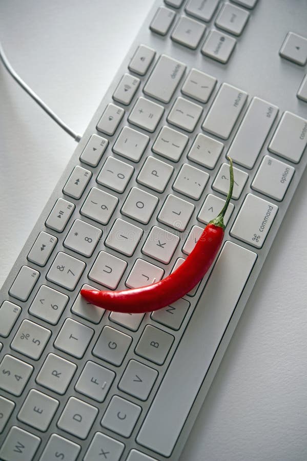 Red Pepper on a Computer Keyboard Stock Image - Image of spicy ...