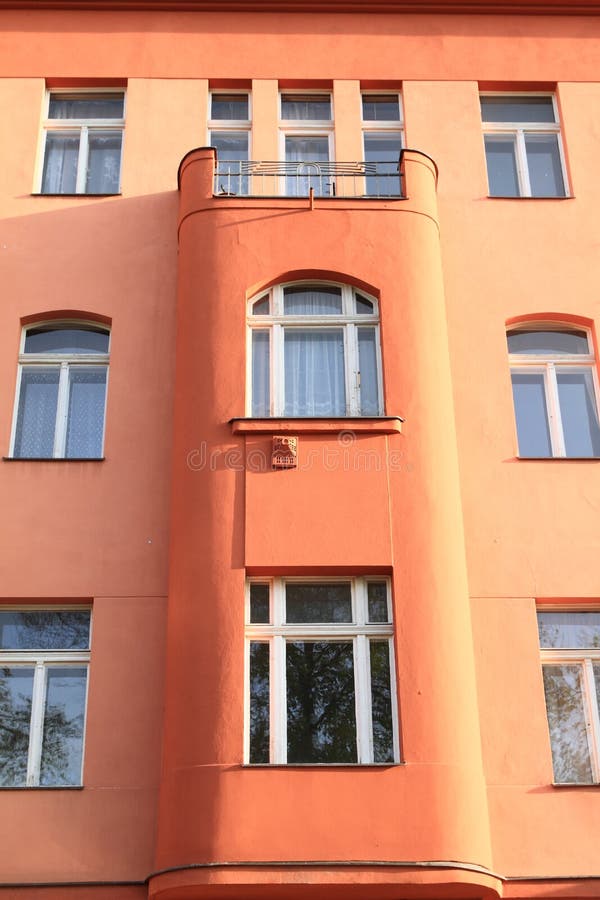 Red house with balcony stock image. Image of building - 53145235