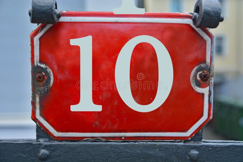 A Red House Number Plaque, Showing the Number Ten 10 Stock Image ...