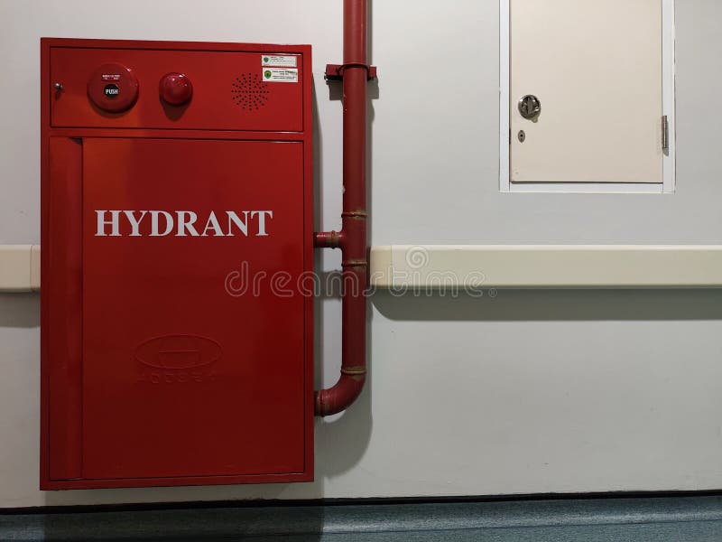Red Hydrant Box and Fire Extinguisher Attached To the Wall Stock Photo ...