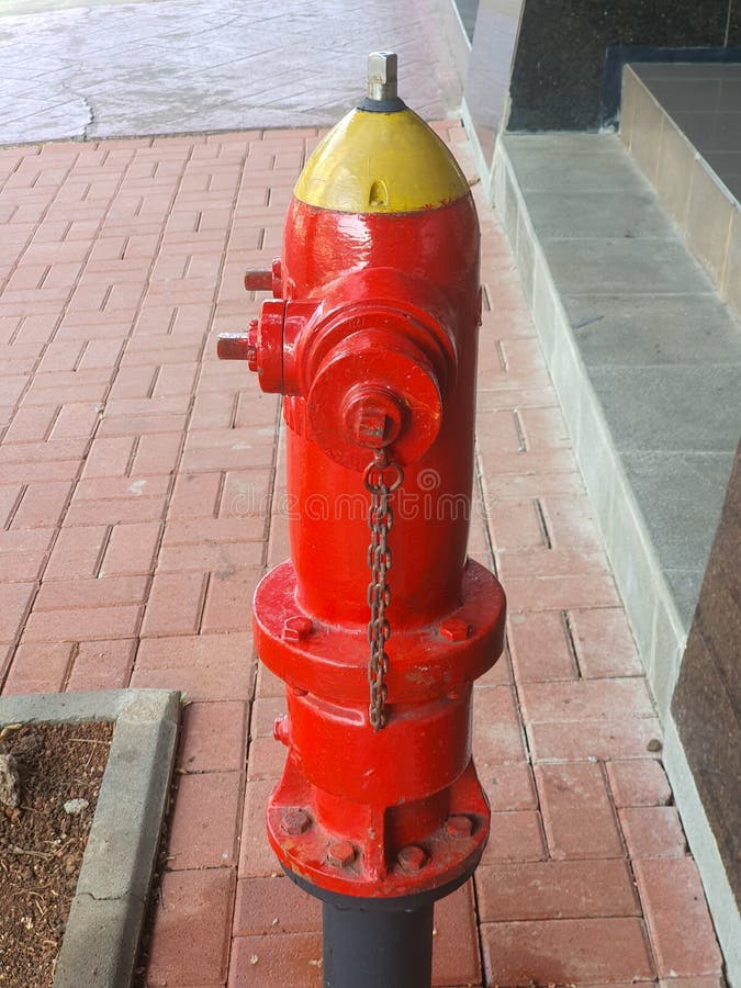 Red Hydrant Pillar Stands Outside the Building Stock Image - Image of ...