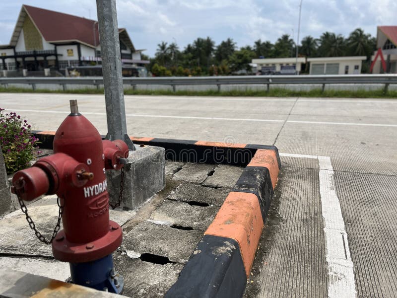 A Red Hydrant for Storing Water during a Fire Incident is Installed on ...