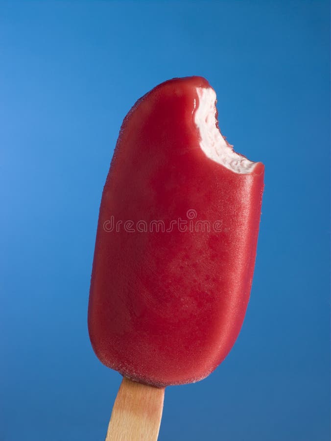Red Ice Block with a Bite Taken Stock Image - Image of color, stick ...